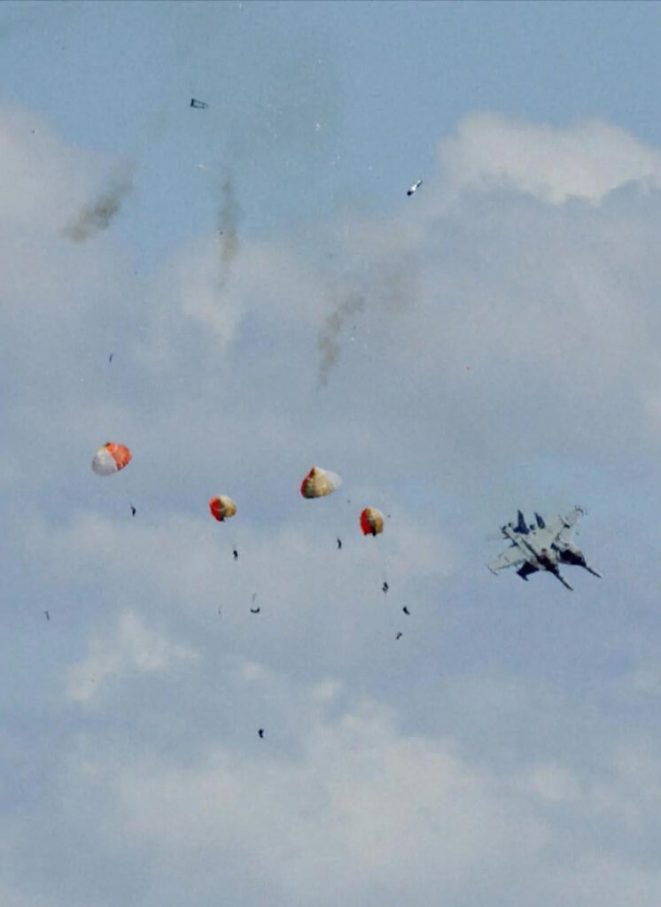 Pilots Eject Safely After Fighter Jets Collide Causing Explosion